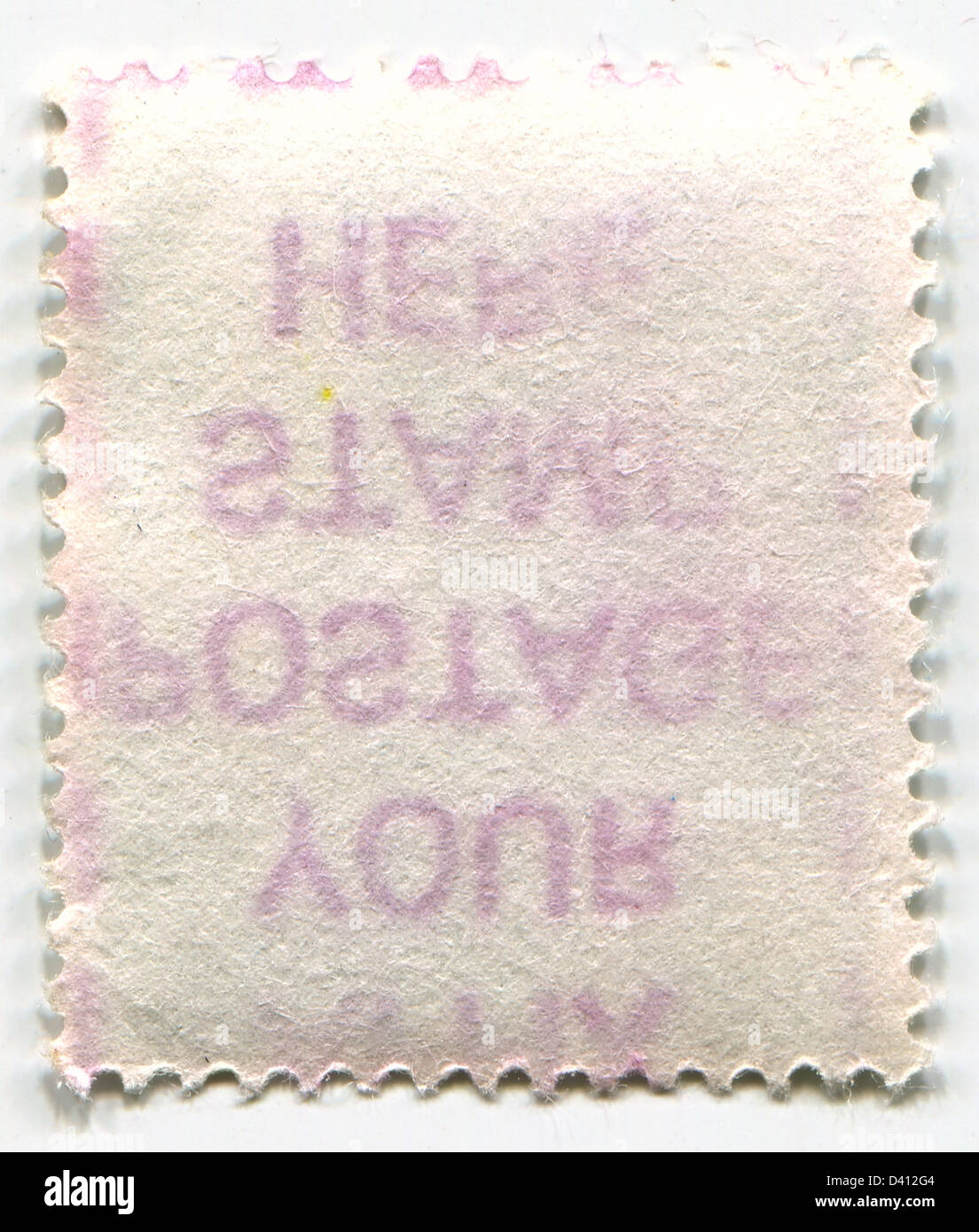 The reverse side of a postage stamp Stock Photo - Alamy