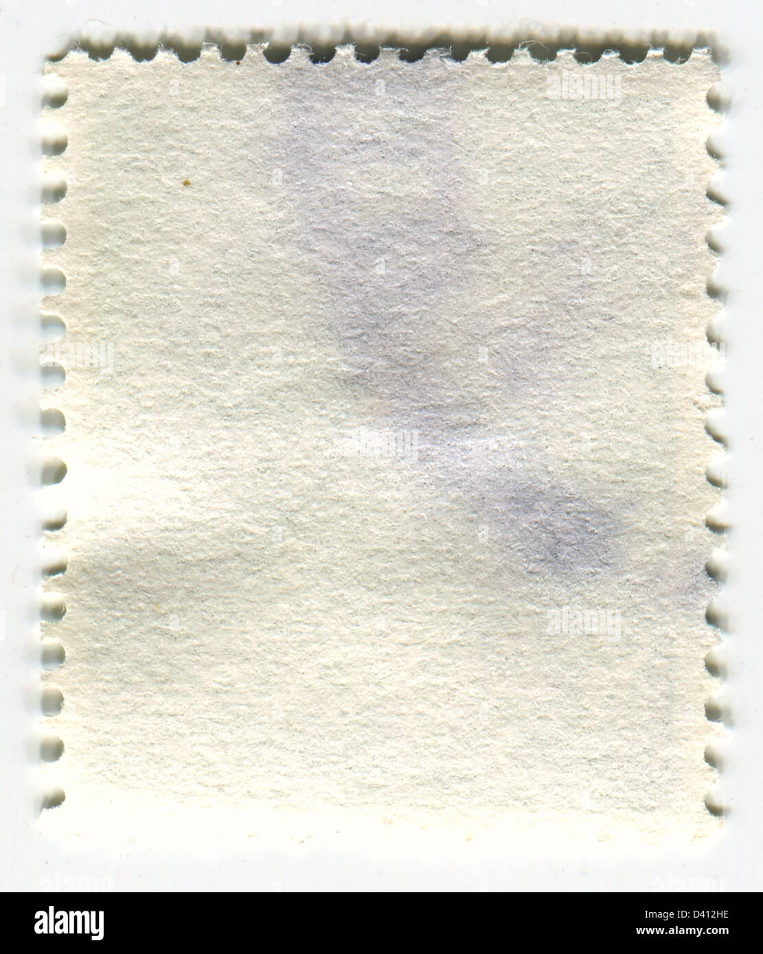 The reverse side of a postage stamp Stock Photo - Alamy