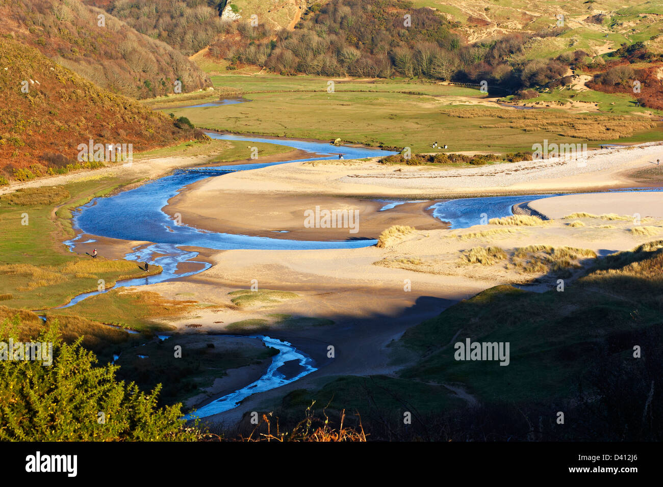High level view of the meandering river that flows into Three Cliffs ...