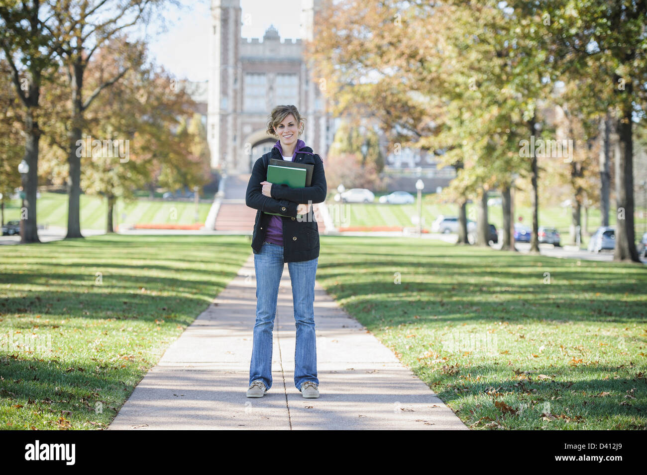 Caucasian student standing on campus Stock Photo - Alamy