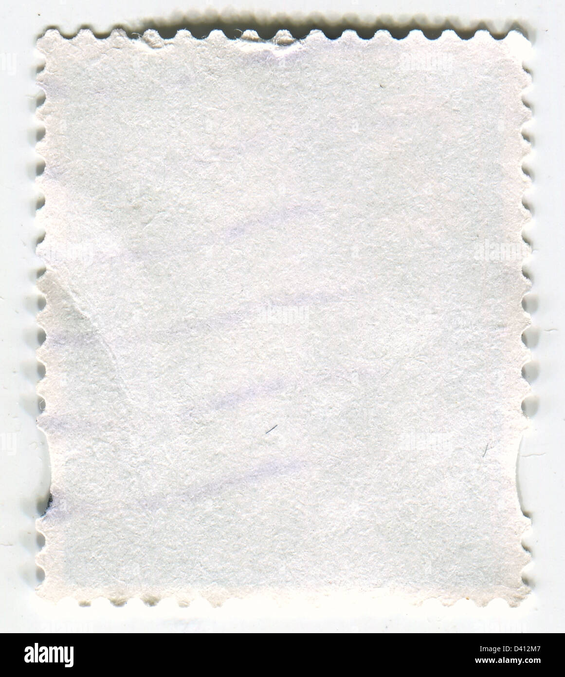The reverse side of a postage stamp Stock Photo - Alamy