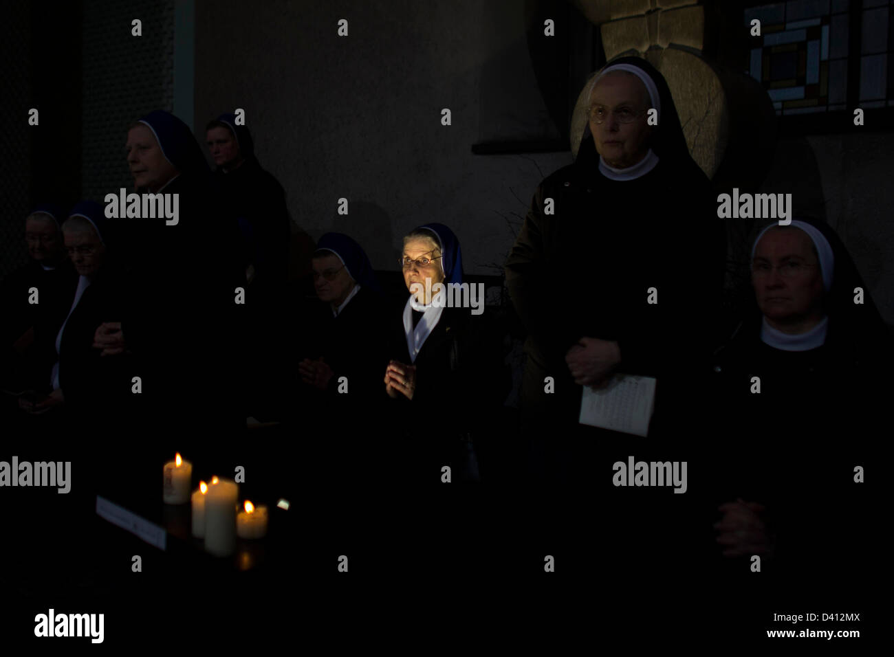 Nuns pray during a thanksgiving service for outgoing pope Benedict XVI ...