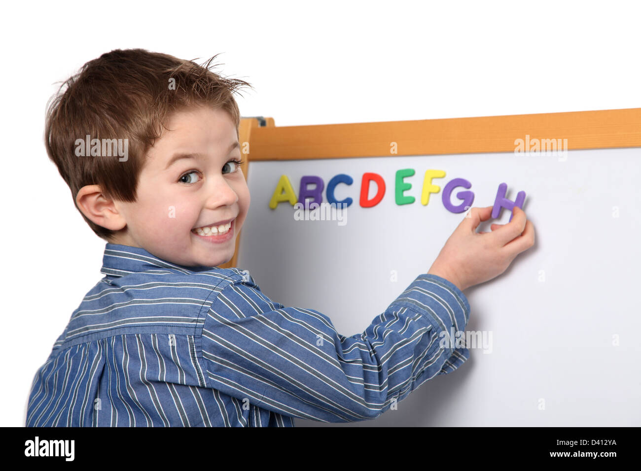 cute young boy learning the ABC Stock Photo - Alamy