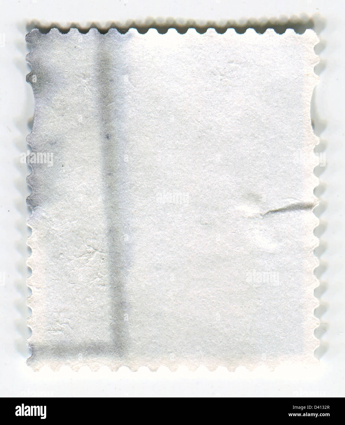 The reverse side of a postage stamp Stock Photo - Alamy