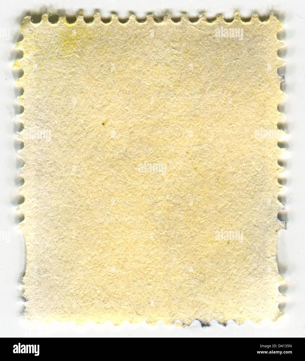 The reverse side of a postage stamp Stock Photo - Alamy