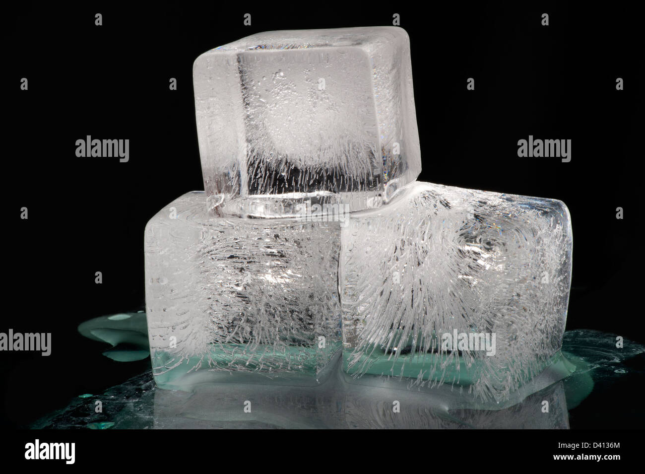 Ice cubes - real ice with black background (no Plastic Stock Photo - Alamy