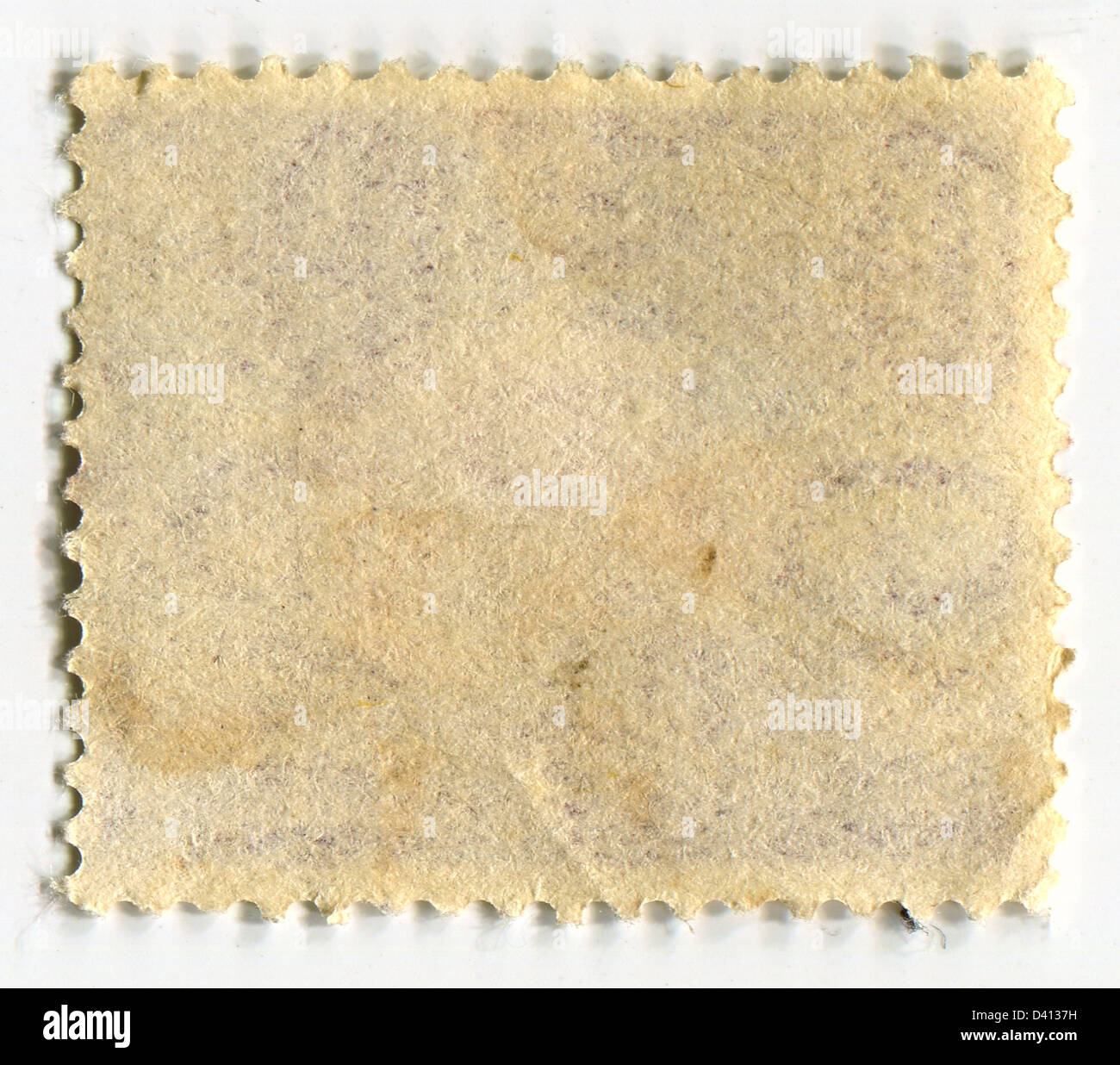 The reverse side of a postage stamp Stock Photo - Alamy