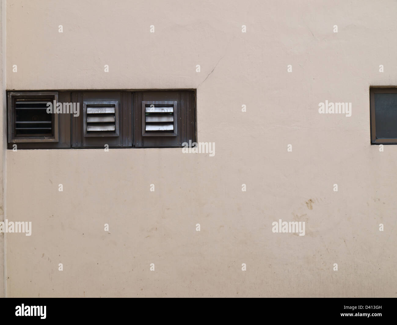 Ventilated windows on wall as background Stock Photo - Alamy