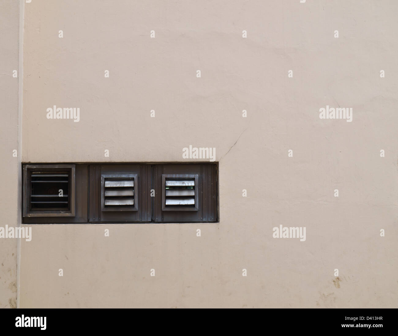 Ventilated windows on wall as background Stock Photo - Alamy