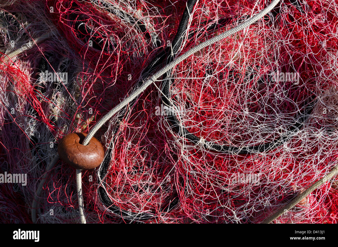 white and red fishing net with float Stock Photo - Alamy