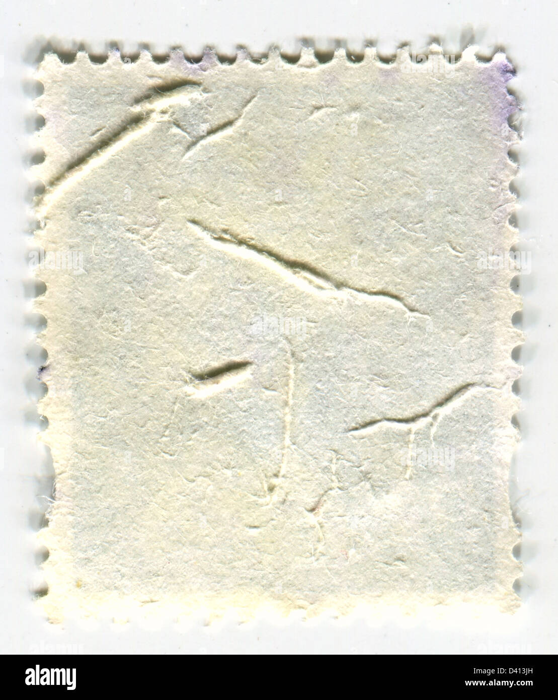 The reverse side of a postage stamp Stock Photo - Alamy