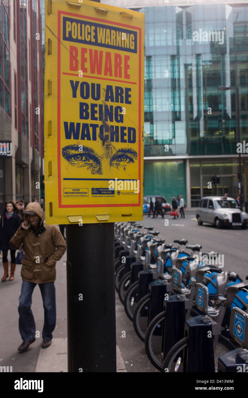 A warning sign aimed at petty criminals, telling them they are under ...