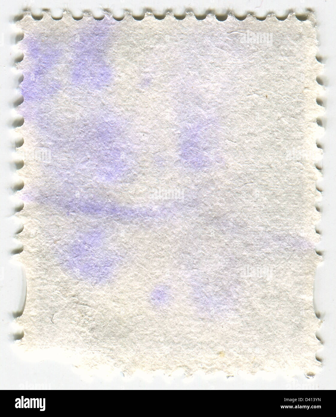 The reverse side of a postage stamp Stock Photo - Alamy