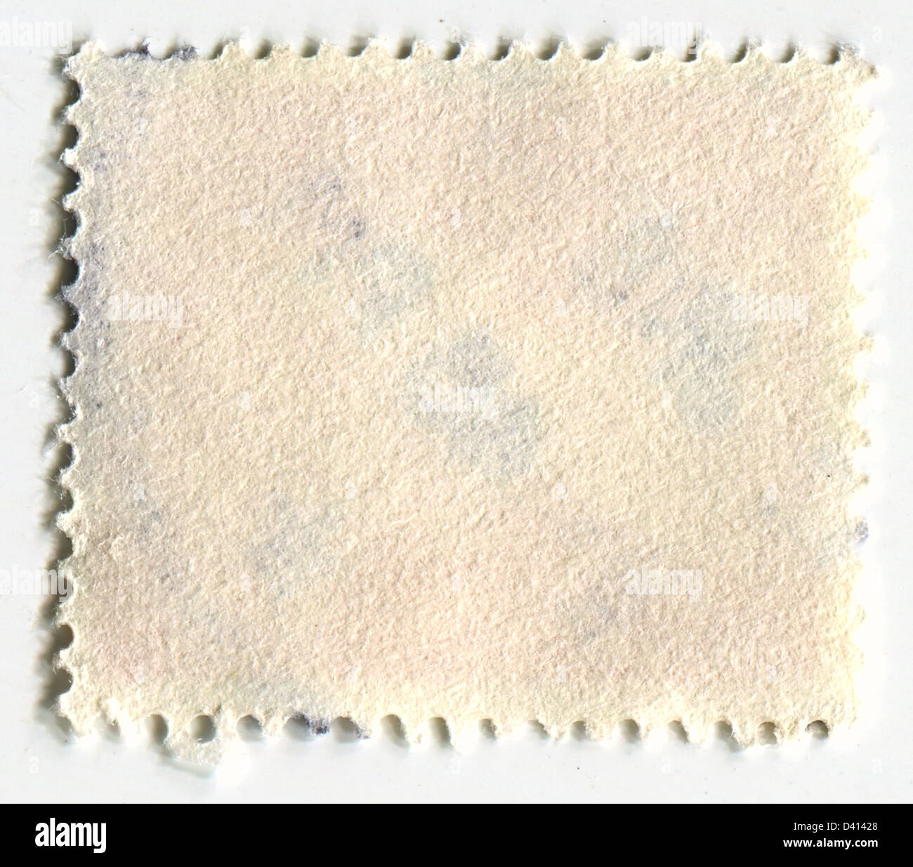 The reverse side of a postage stamp Stock Photo - Alamy