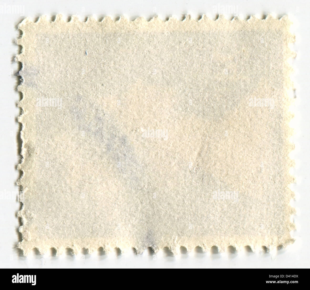 The reverse side of a postage stamp Stock Photo - Alamy