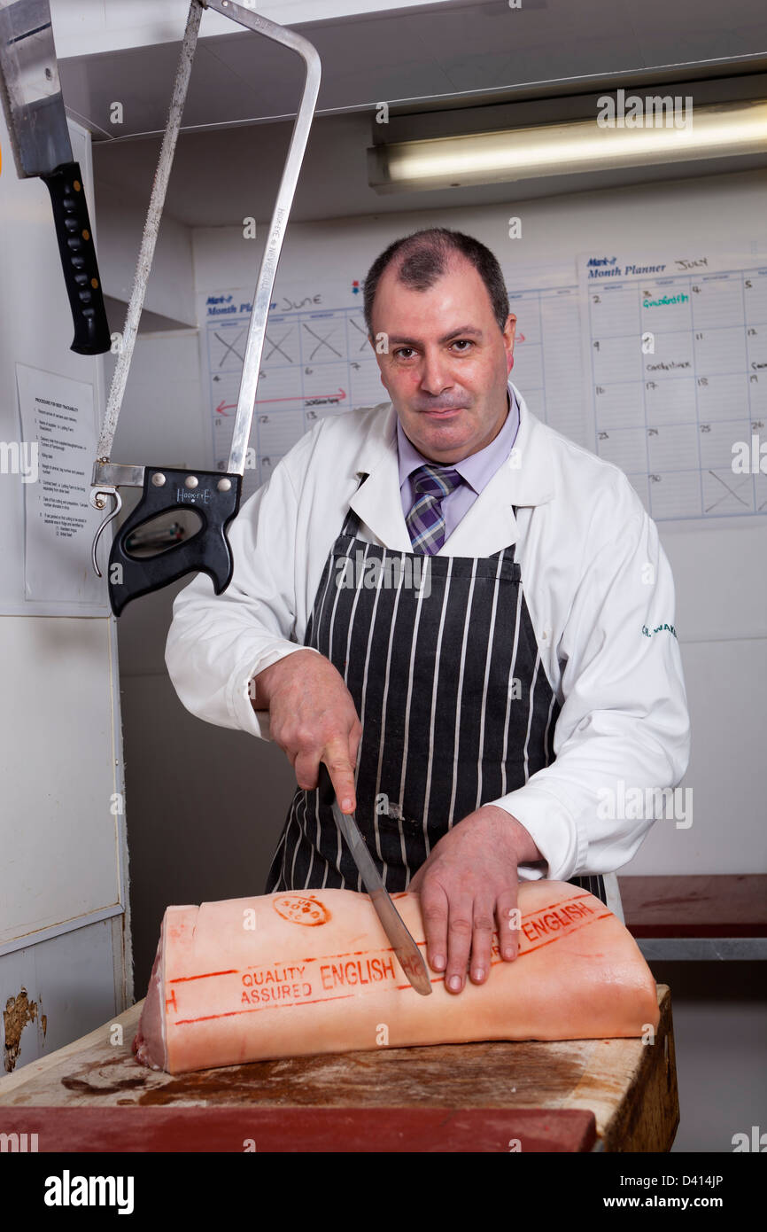 Roger Wakeling Butcher Cutting Meat Stock Photo - Alamy