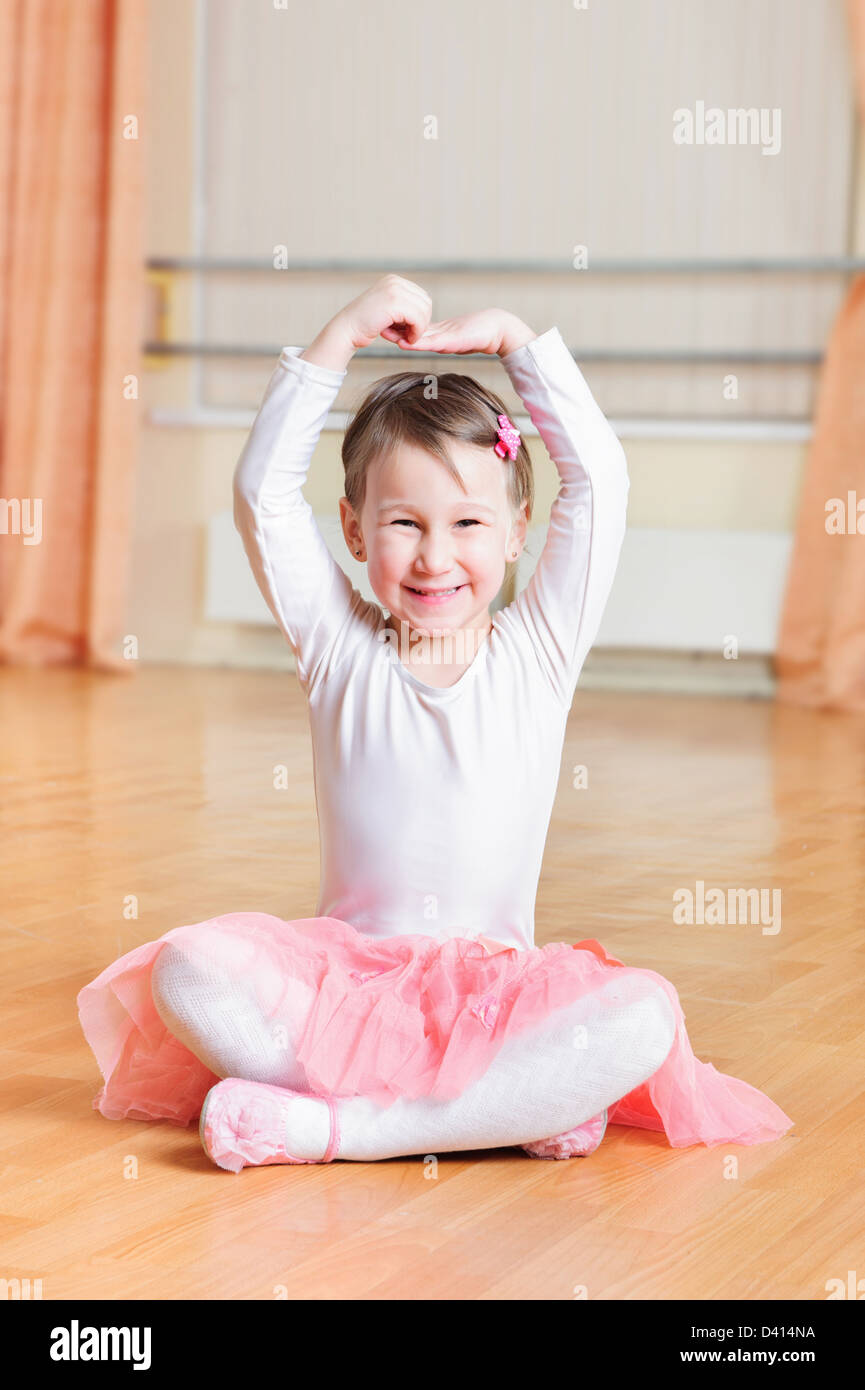 Cute little ballerina training at ballet class Stock Photo - Alamy
