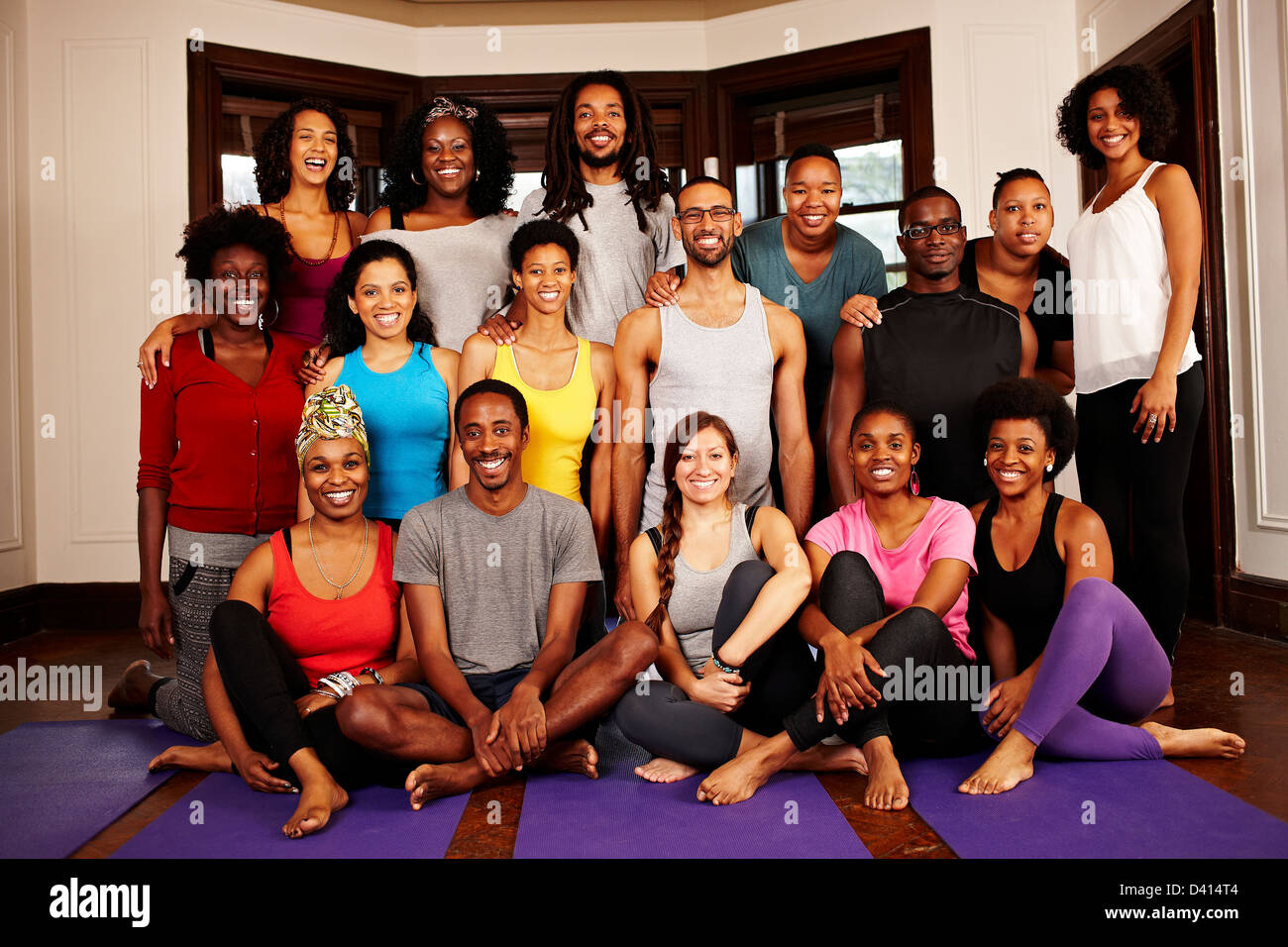 People smiling together in yoga class Stock Photo - Alamy