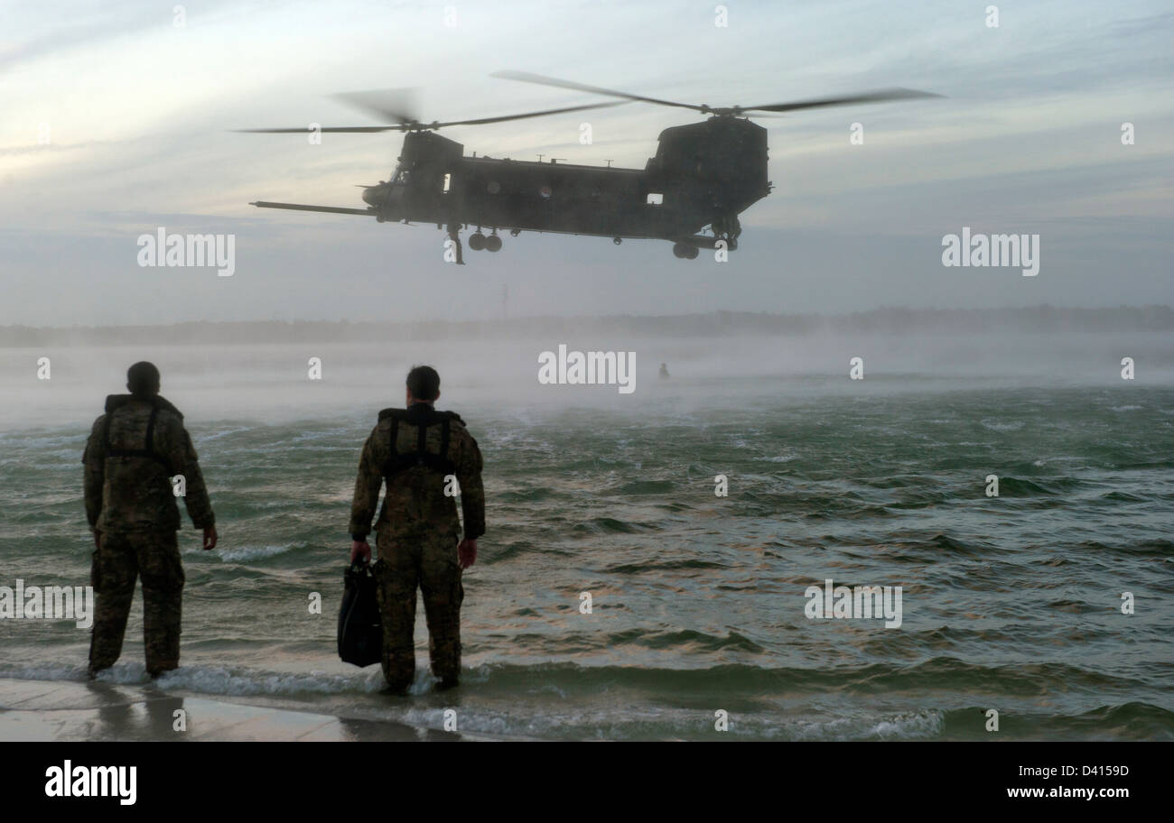 US Green Beret Special Forces soldiers prepare to enter the water while ...