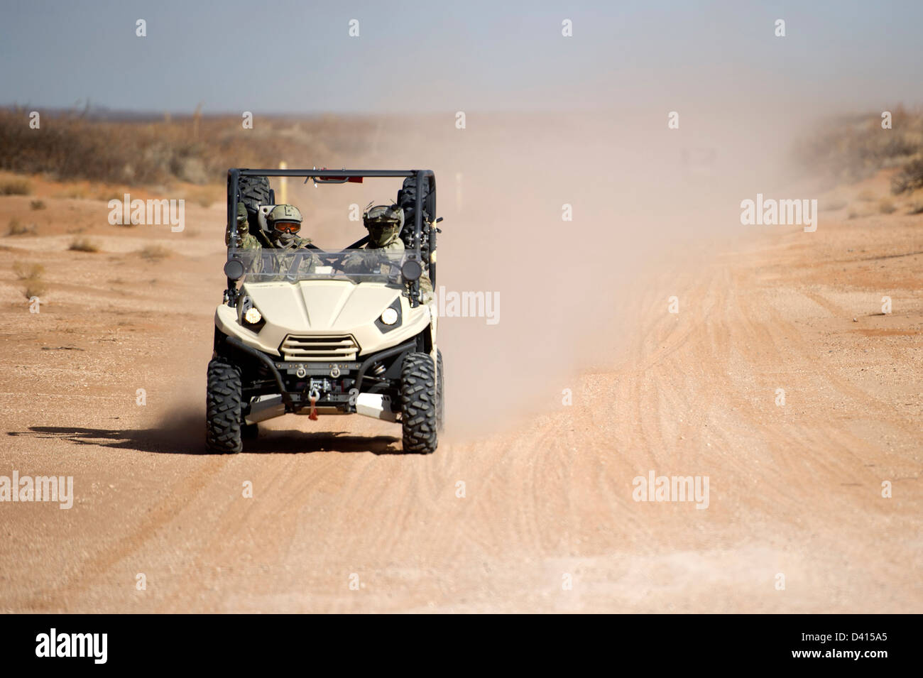 US Green Beret Special Forces soldiers perform off-road maneuvers with ...