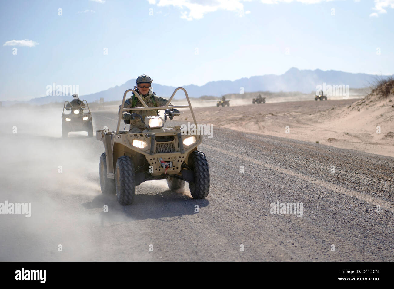 US Green Beret Special Forces soldiers perform off-road maneuvers with ...