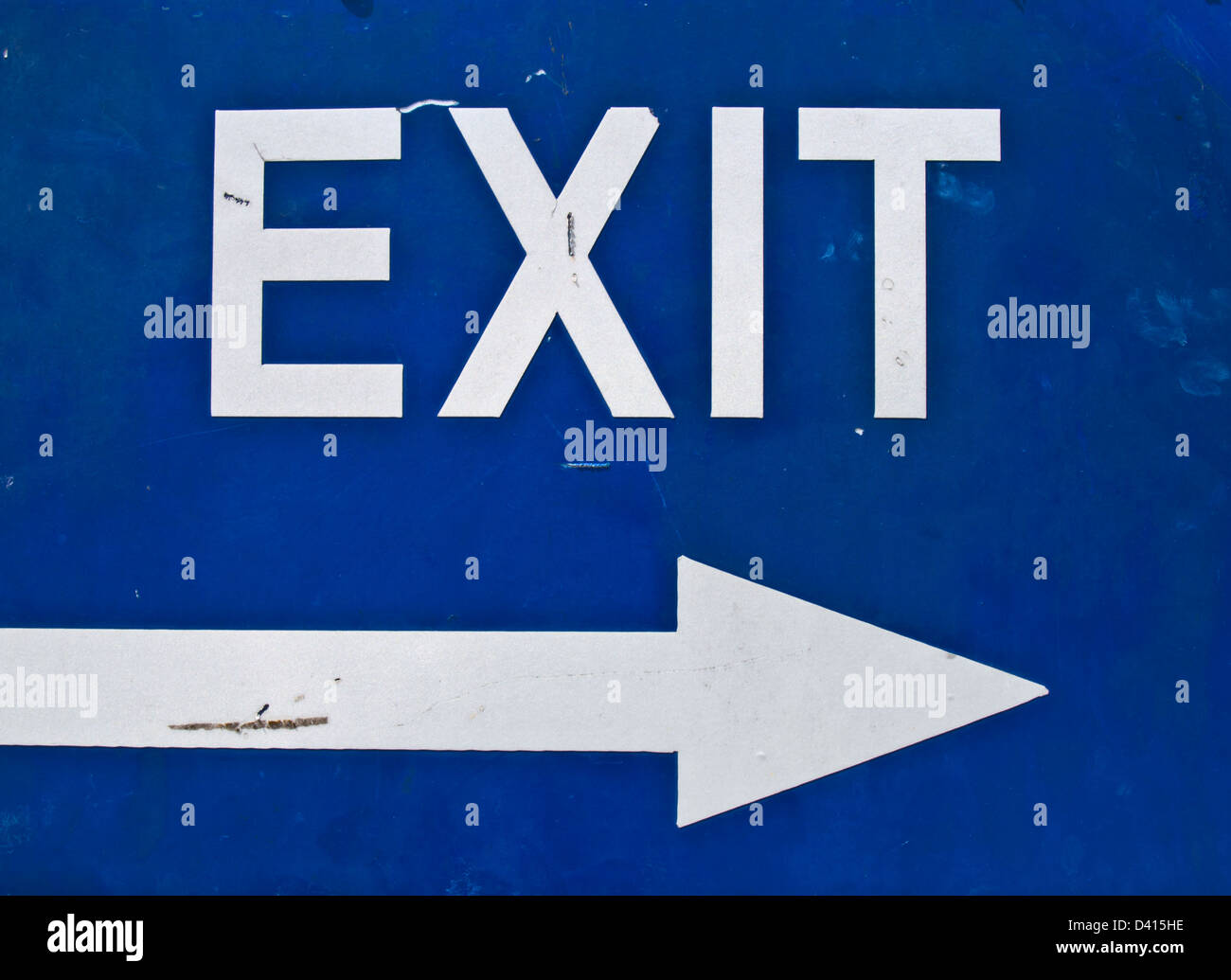 Blue exit road sign with arrow Stock Photo - Alamy
