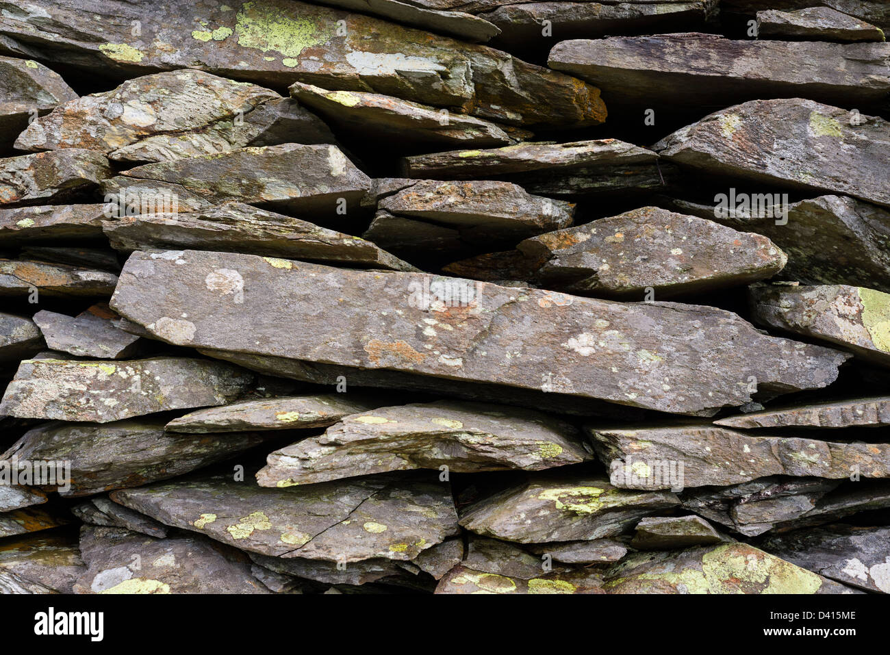 Slate formations at old slate quarry just below summit of Castle Crag ...