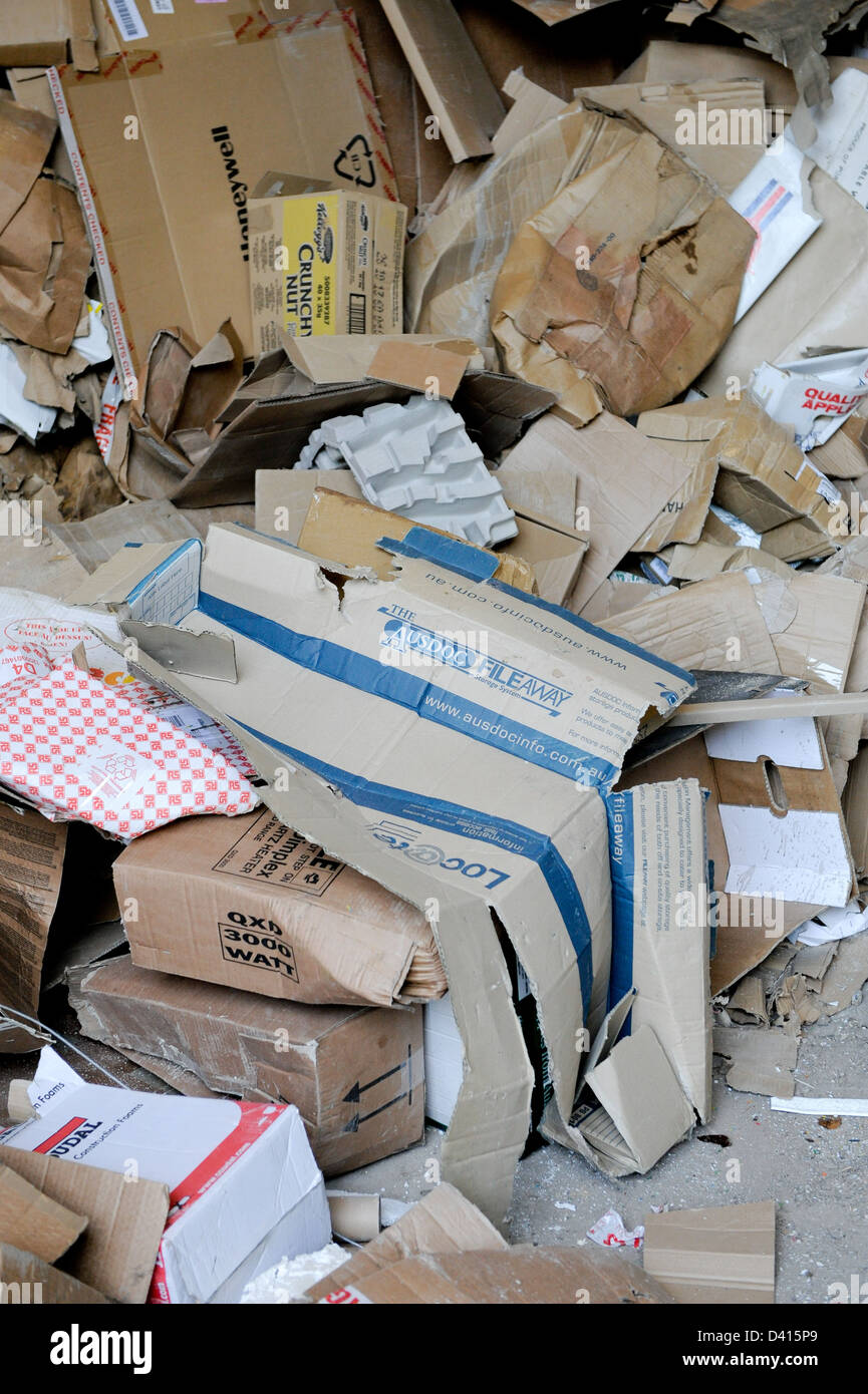 Cardboard recycling at recycling plant Stock Photo - Alamy