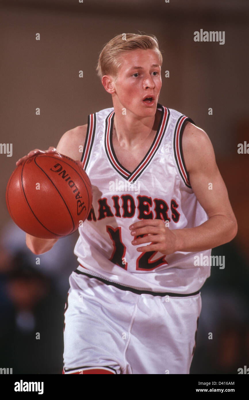 Boy's High School Basketball action Stock Photo - Alamy