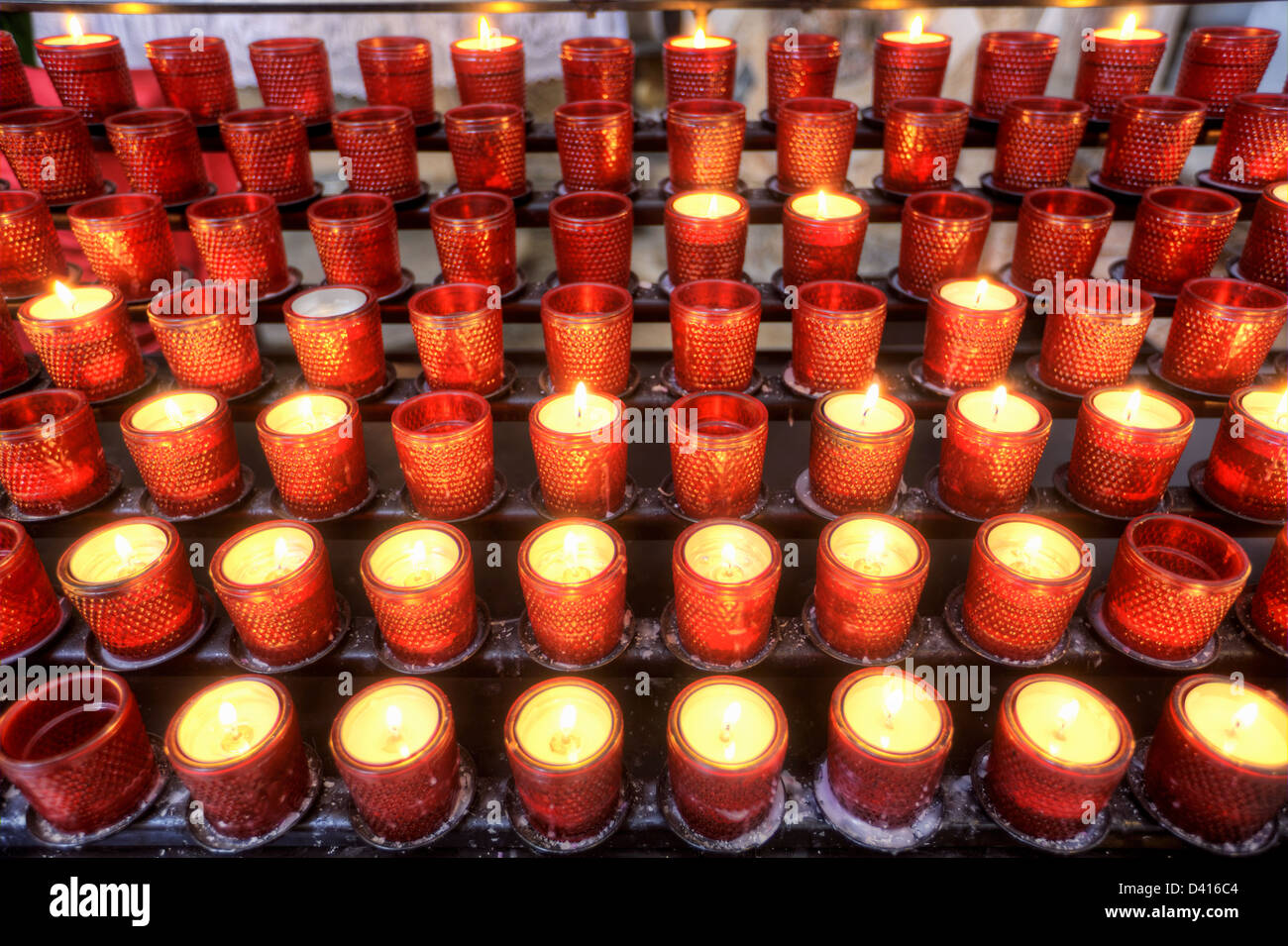 Many burning candles in hi-res stock photography and images - Alamy