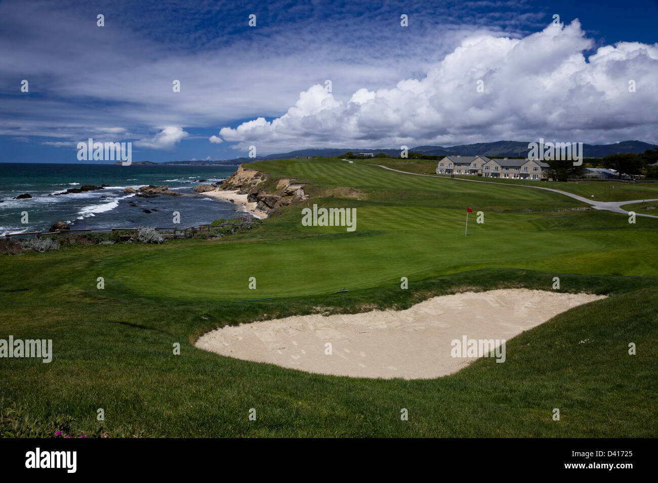 Pristine elevated golf course green and bunker overlooking the Pacific ...