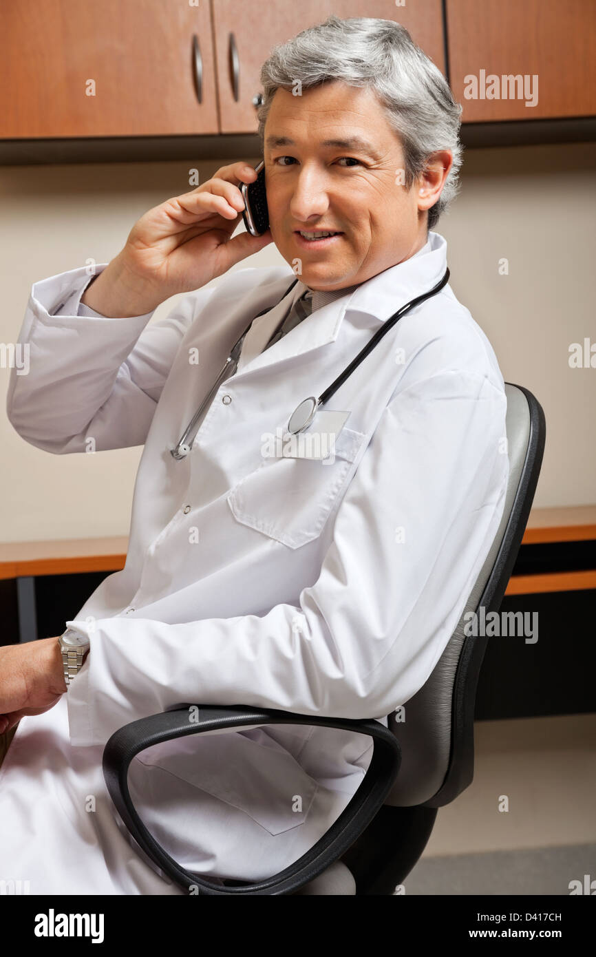 Doctor Answering Phone Call Stock Photo - Alamy