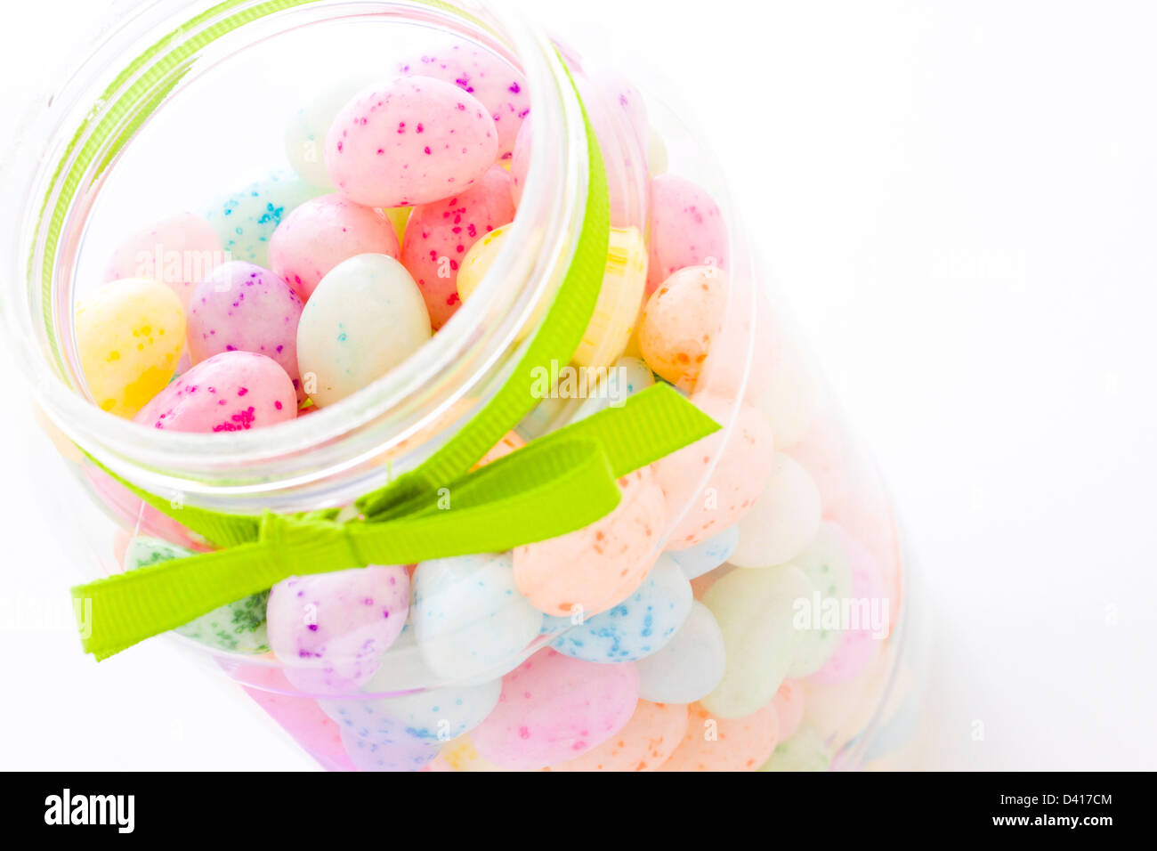Assorted jelly beans in pastel colors with darker spots Stock Photo - Alamy