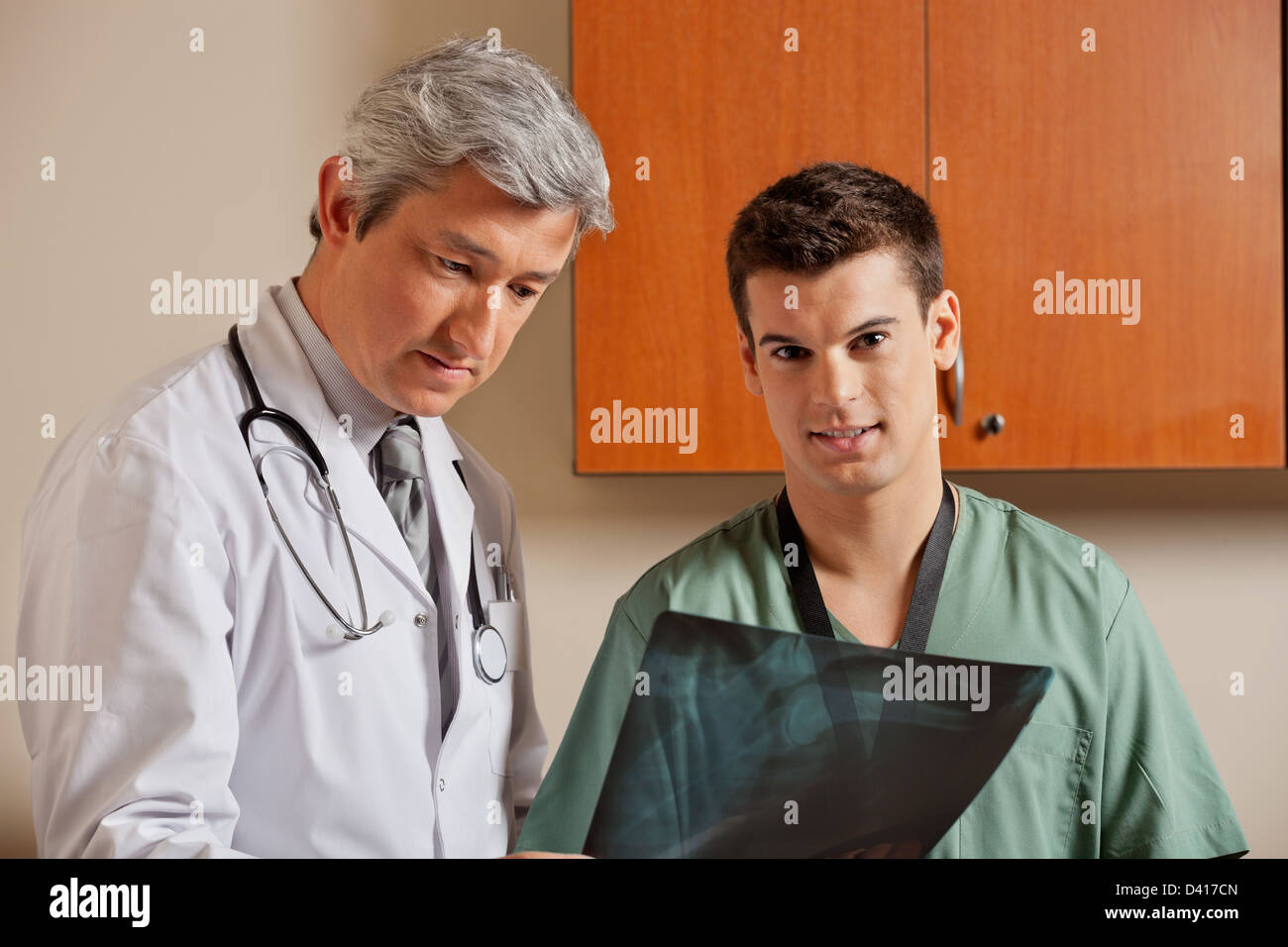 Male Technician With Radiologist Stock Photo - Alamy