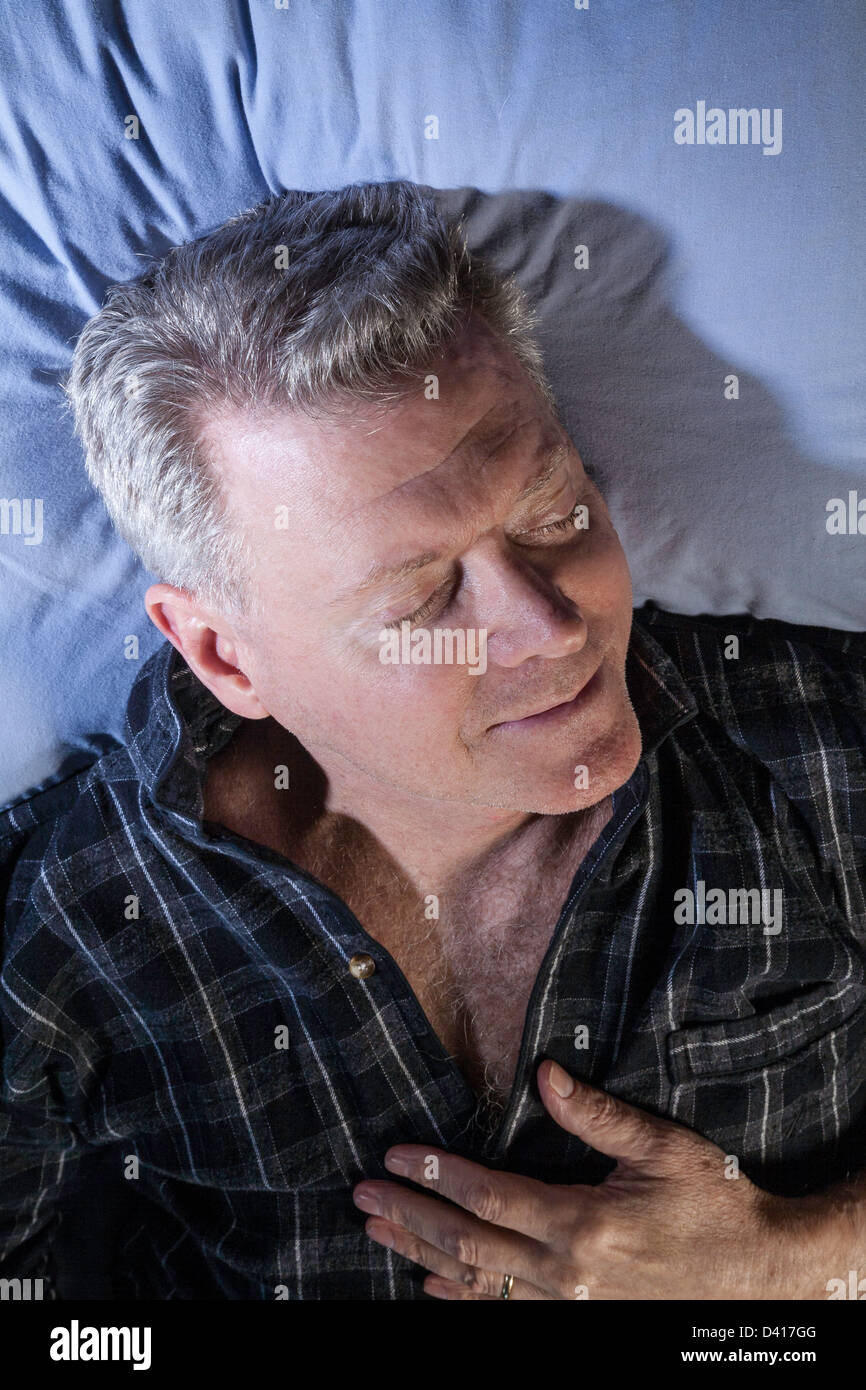 Man bed pillow hi-res stock photography and images - Alamy