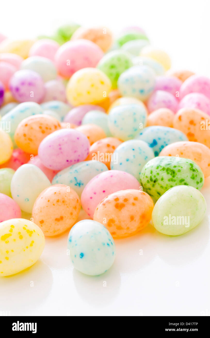 Assorted jelly beans in pastel colors with darker spots Stock Photo - Alamy