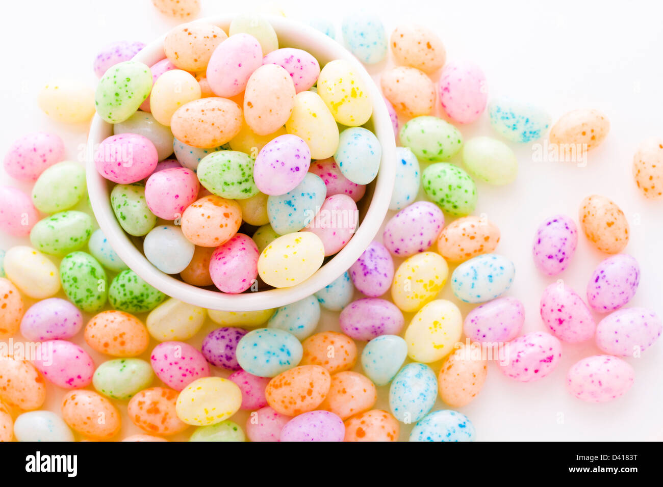 Assorted jelly beans in pastel colors with darker spots Stock Photo - Alamy