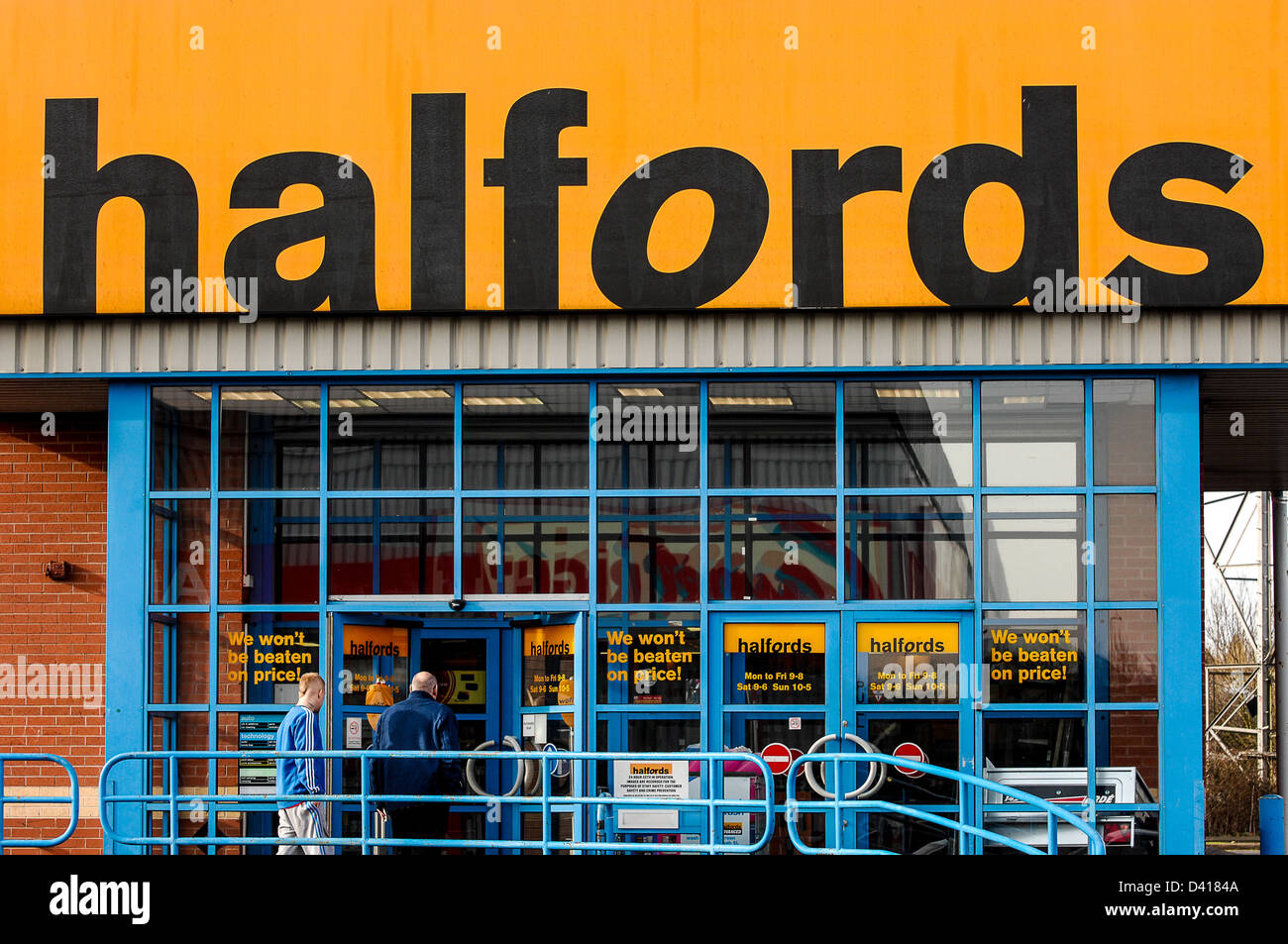Halfords shop sign Stock Photo - Alamy