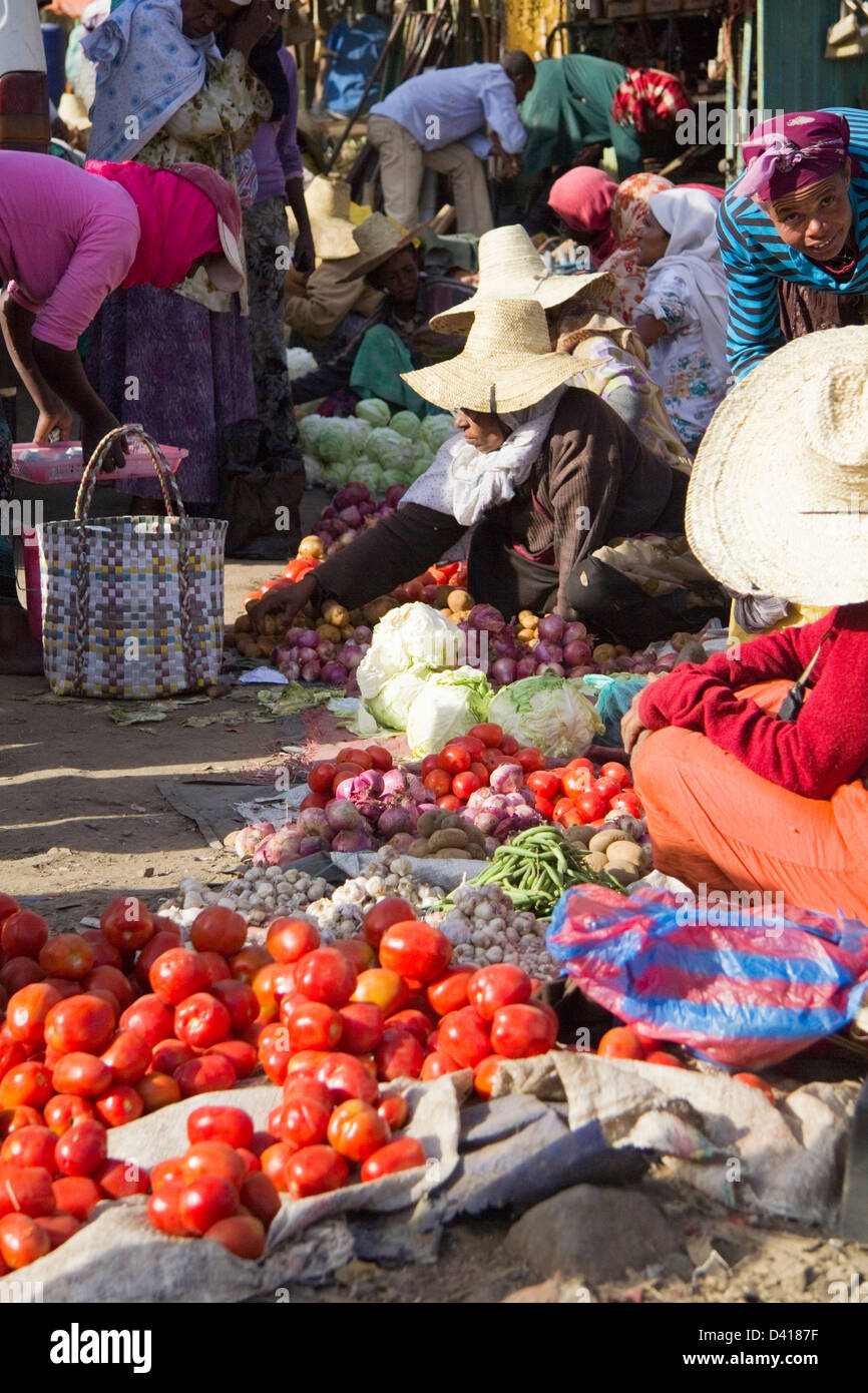Selling vegetables at the Mercato, the largest market in Africa, Addis ...