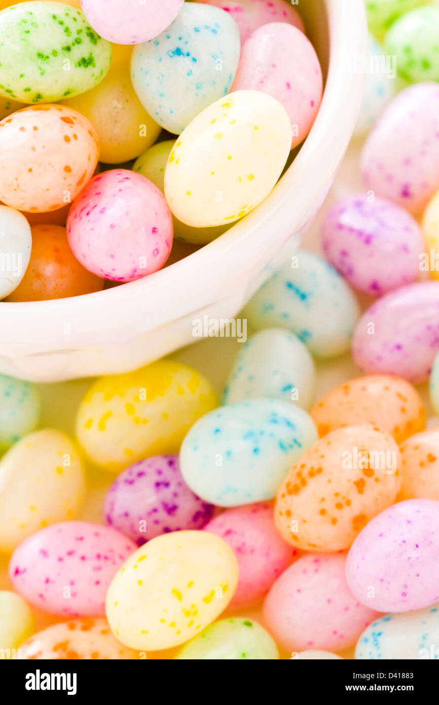Assorted jelly beans in pastel colors with darker spots Stock Photo - Alamy