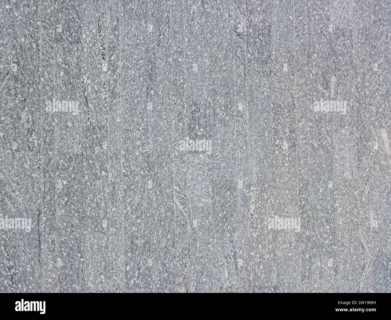 A polished grey granite wall as background Stock Photo - Alamy