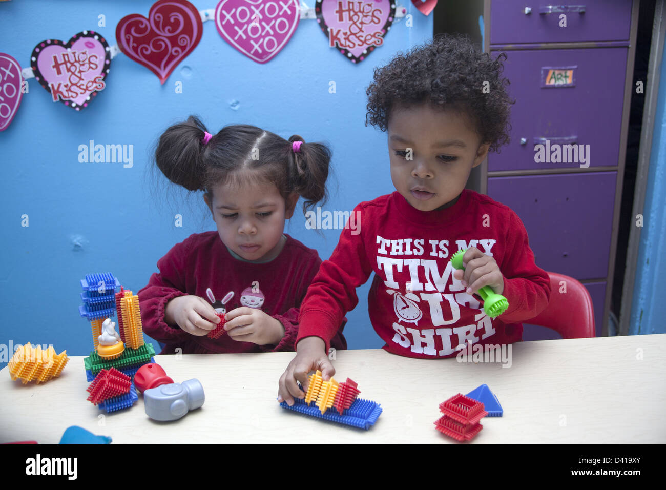 Diverse children playing in classroom hi-res stock photography and ...