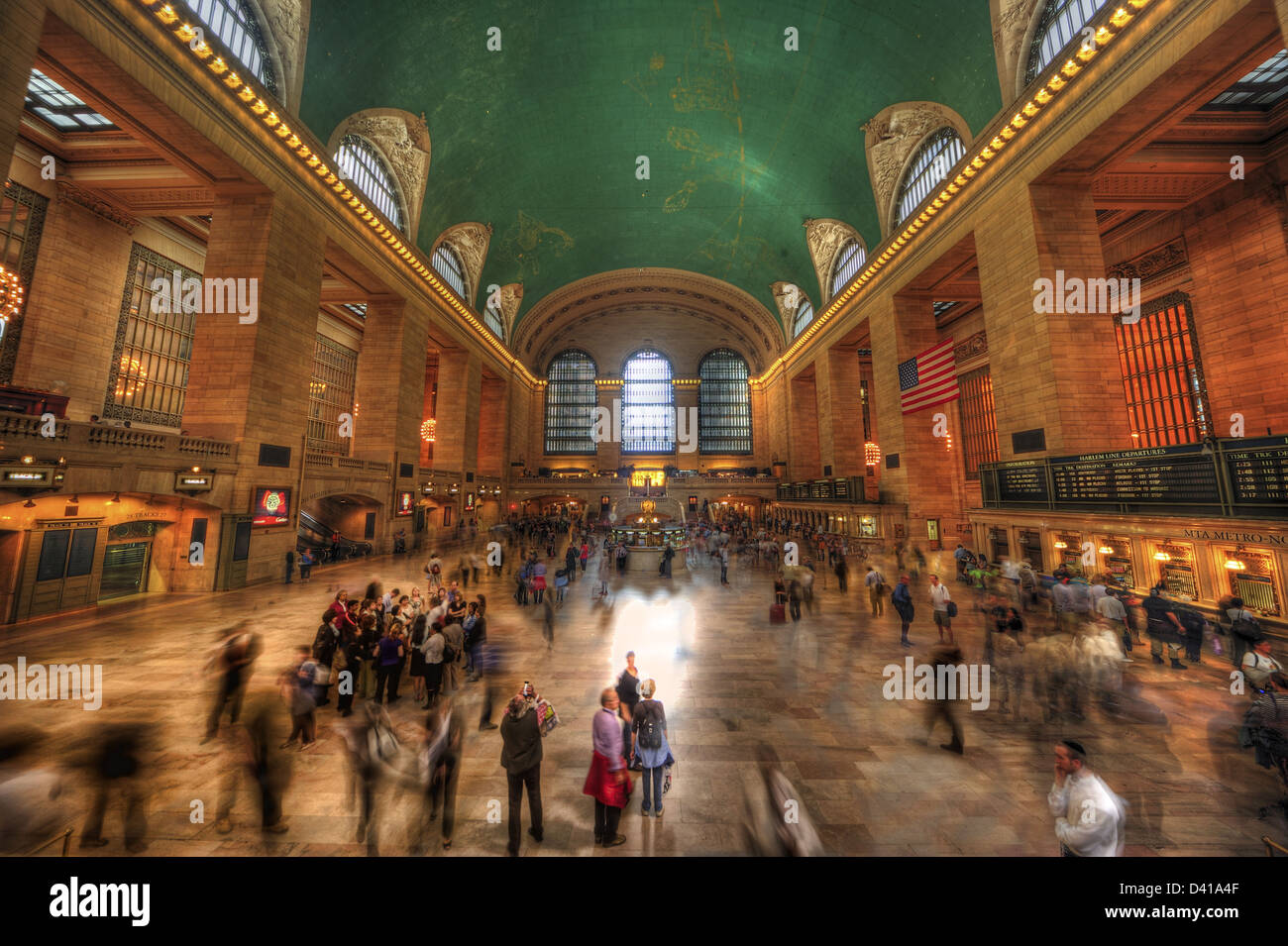 A long exposure showing passengers rushing through the interior of ...
