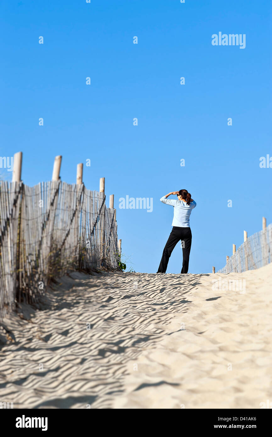 Woman relaxing at the beach, Cape Cod, MA, USA Stock Photo - Alamy
