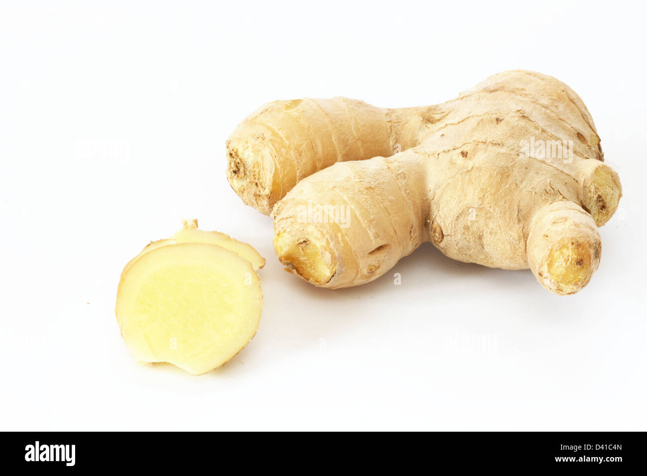 Whole raw ginger root piece on white background Stock Photo - Alamy