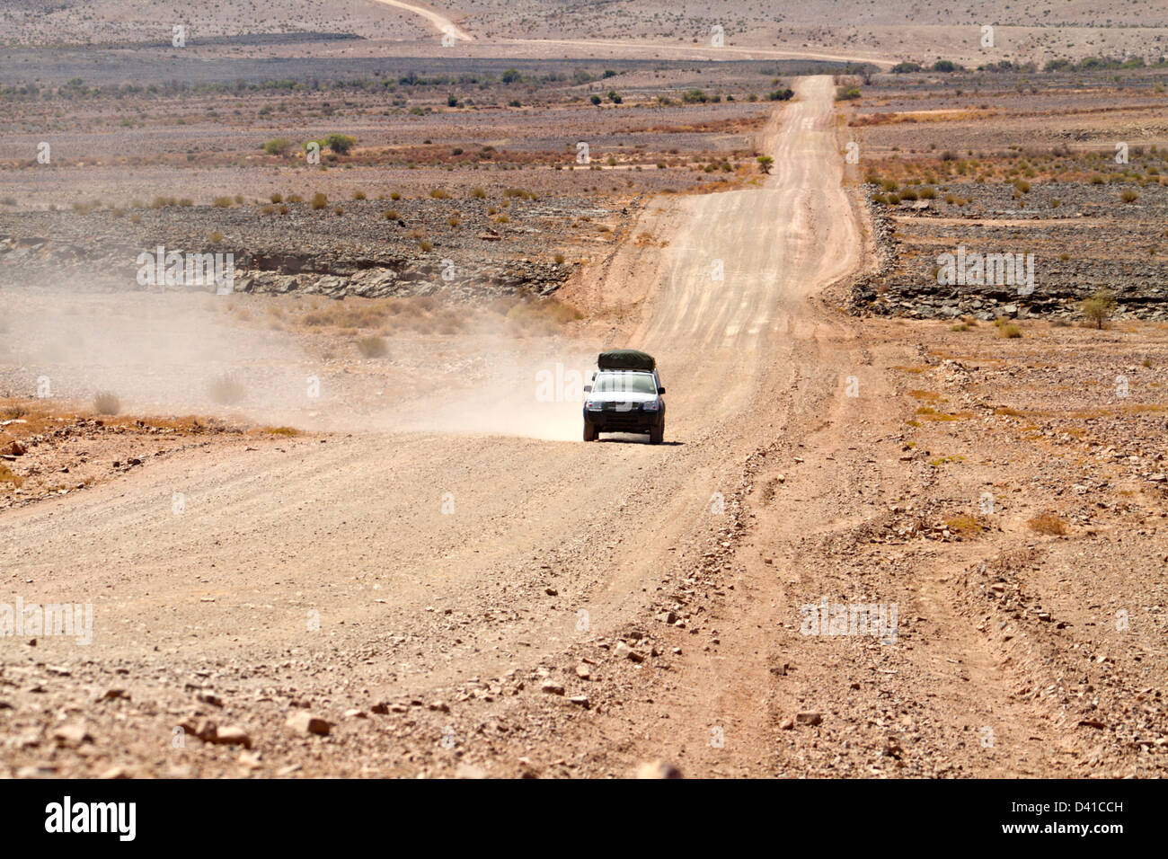 SUV with tourists traveling in Namibia Stock Photo - Alamy