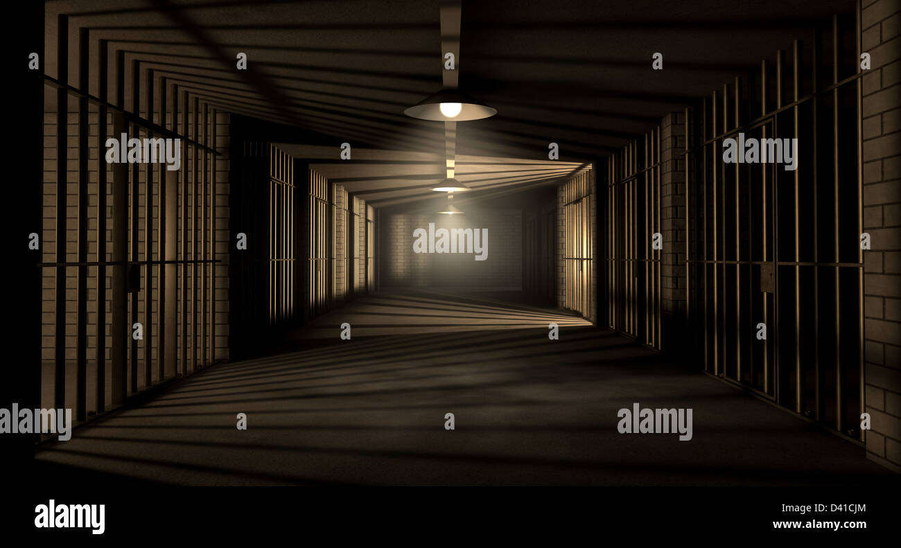A corridor in a prison at night showing jail cells illuminated by ...