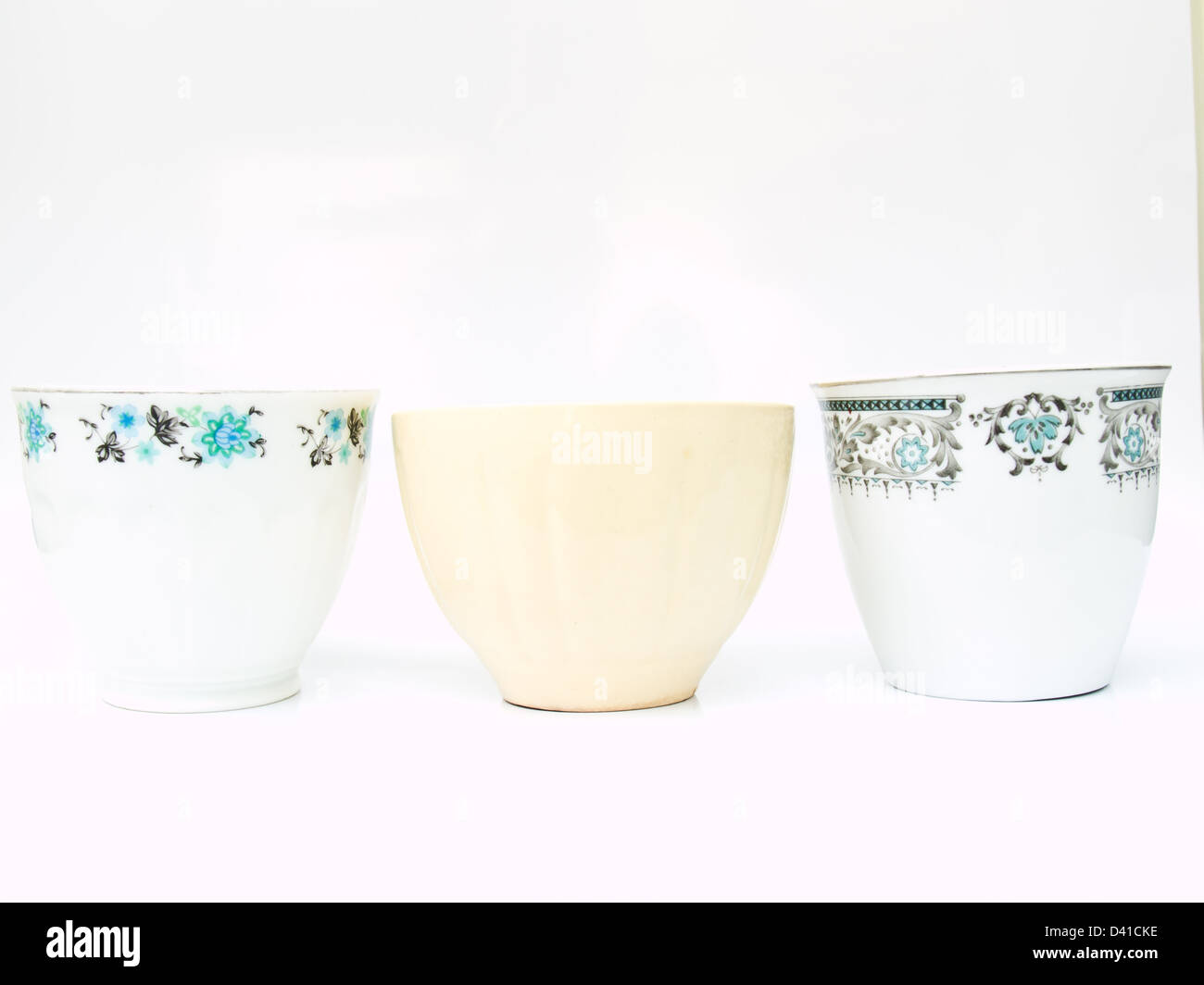 Three tea cup isolated on white background Stock Photo - Alamy