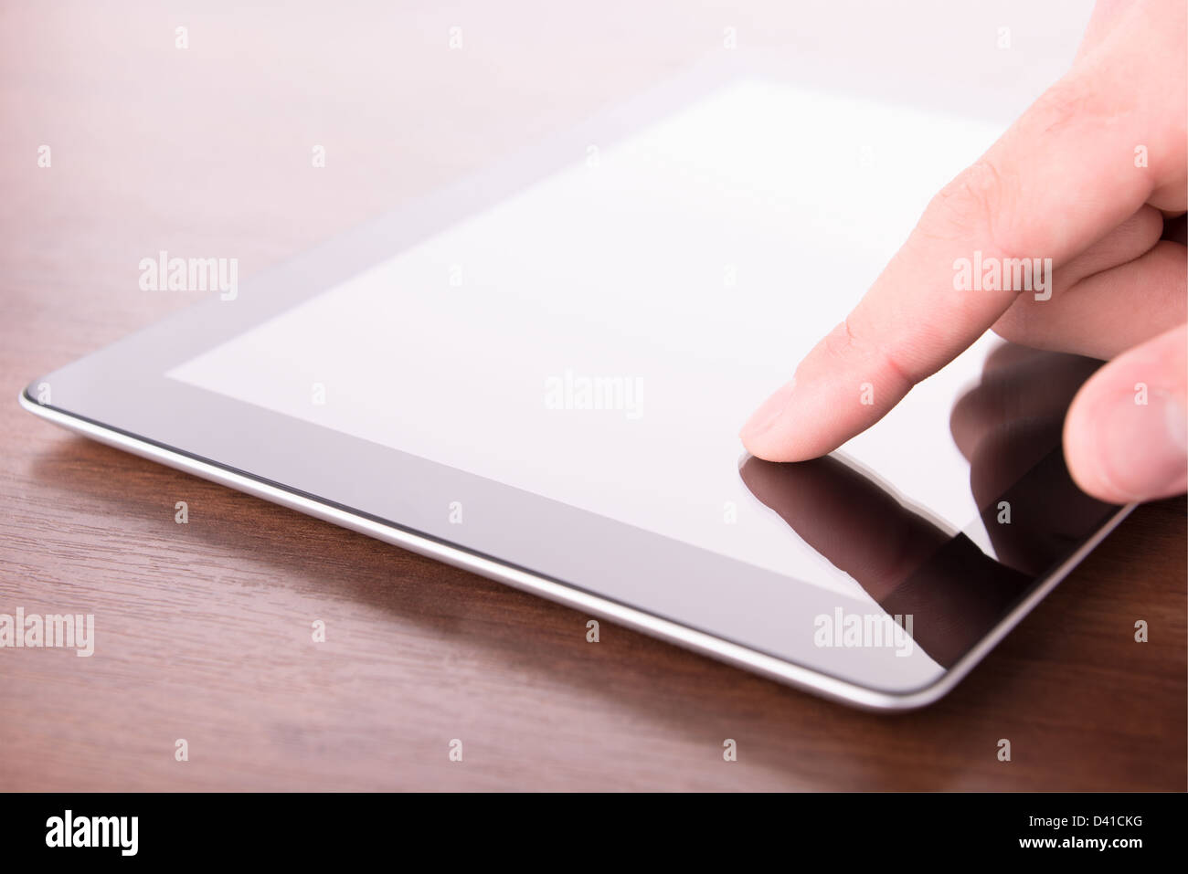 hand touching screen on modern digital tablet pc. Close up Stock Photo ...