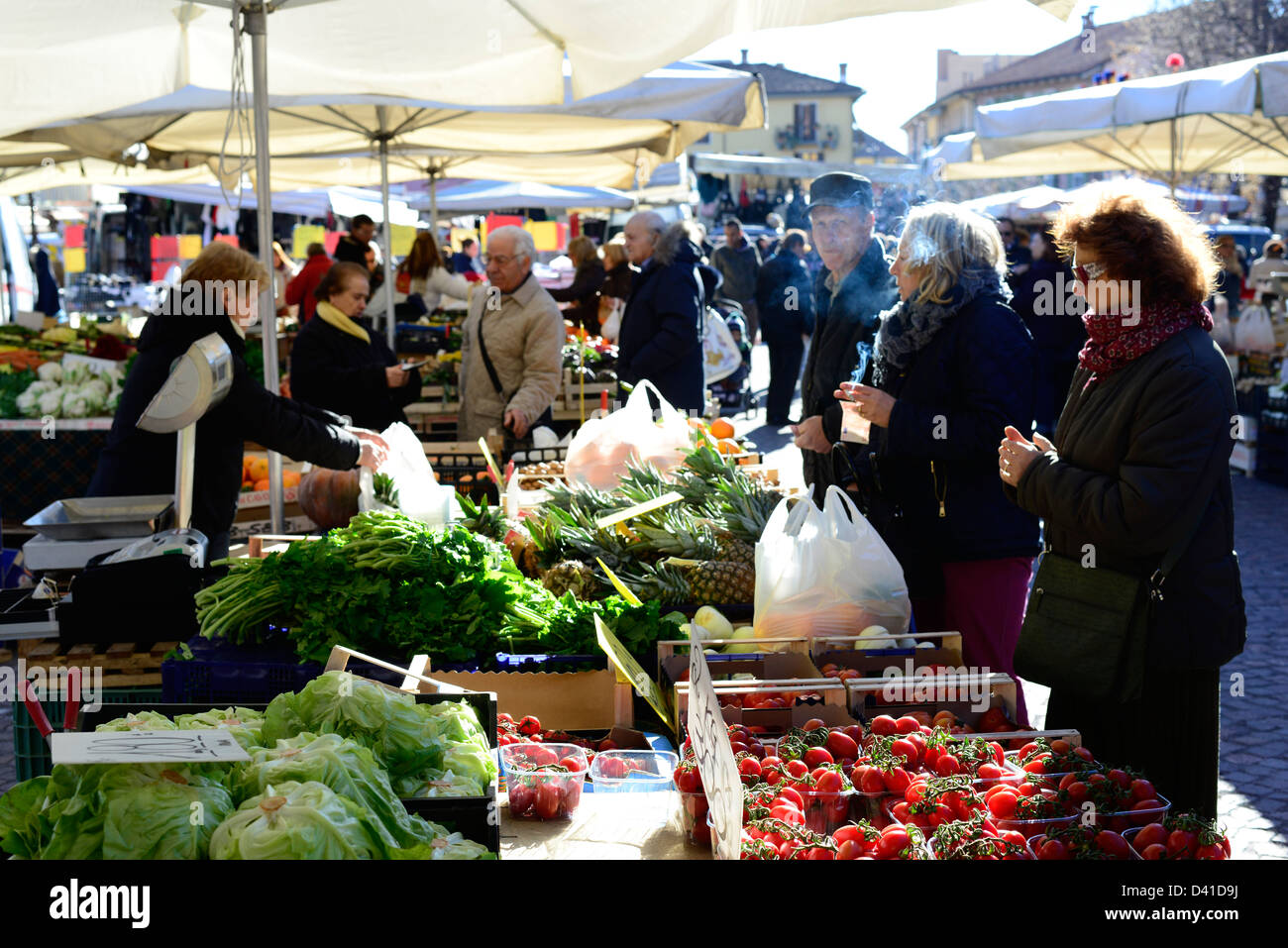 Local produce sold in the colorful outdoor market in Bra, Piedmont ...